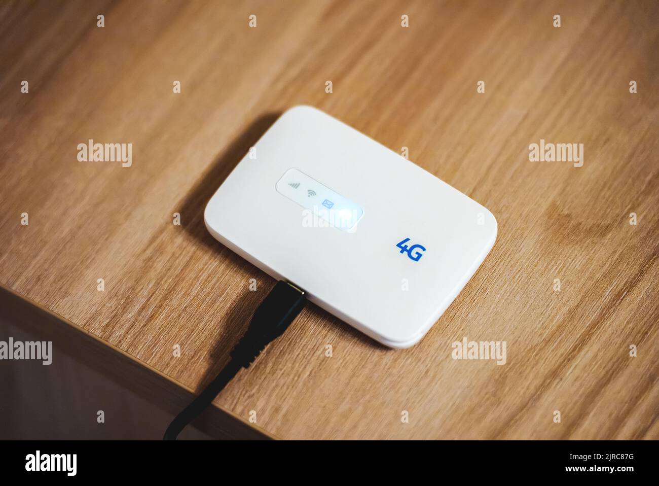 Modern wireless pocket 4g wifi modem Stock Photo - Alamy