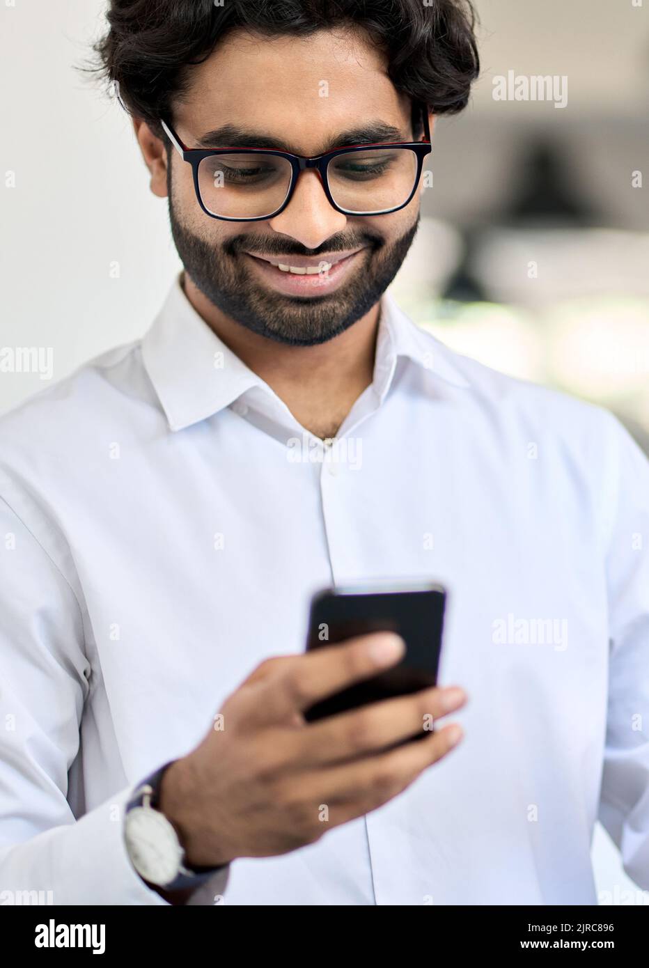 Young happy man smartphone in hi-res stock photography and images - Alamy