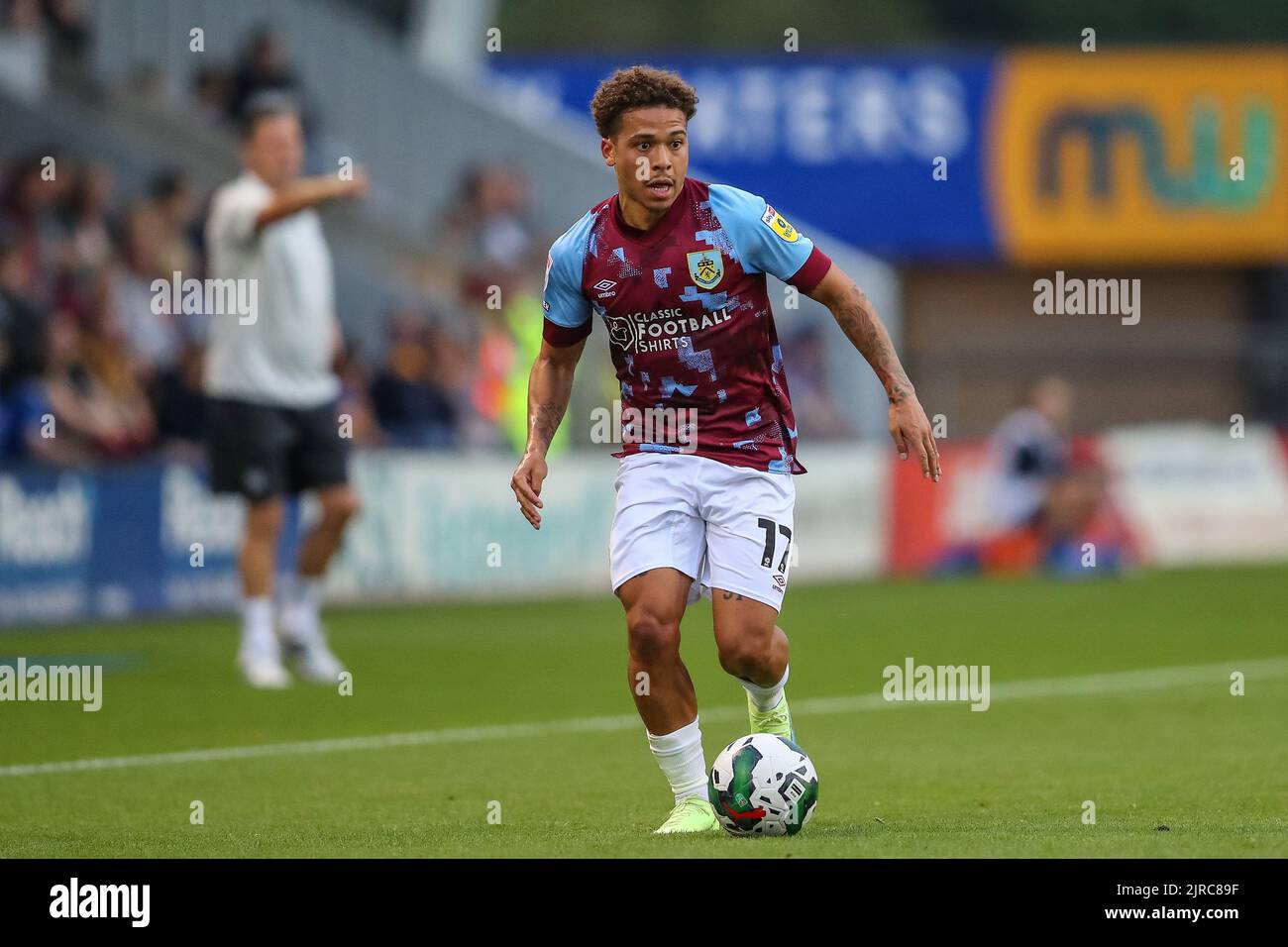 Manuel Benson Hedilazio #17 of Burnley runs with the ball Stock Photo ...
