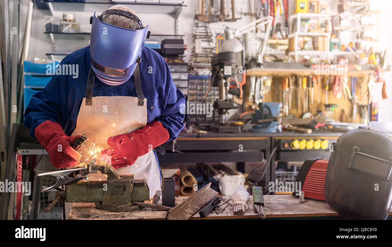 Skillful metal worker working arc hi-res stock photography and images ...