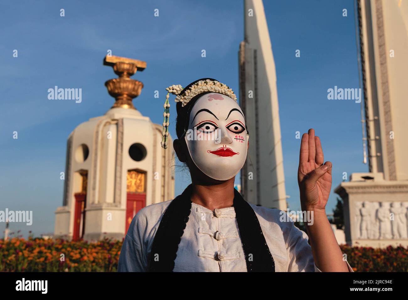 Demonstrator being seen wearing a cursed mask which was a mixed of ...