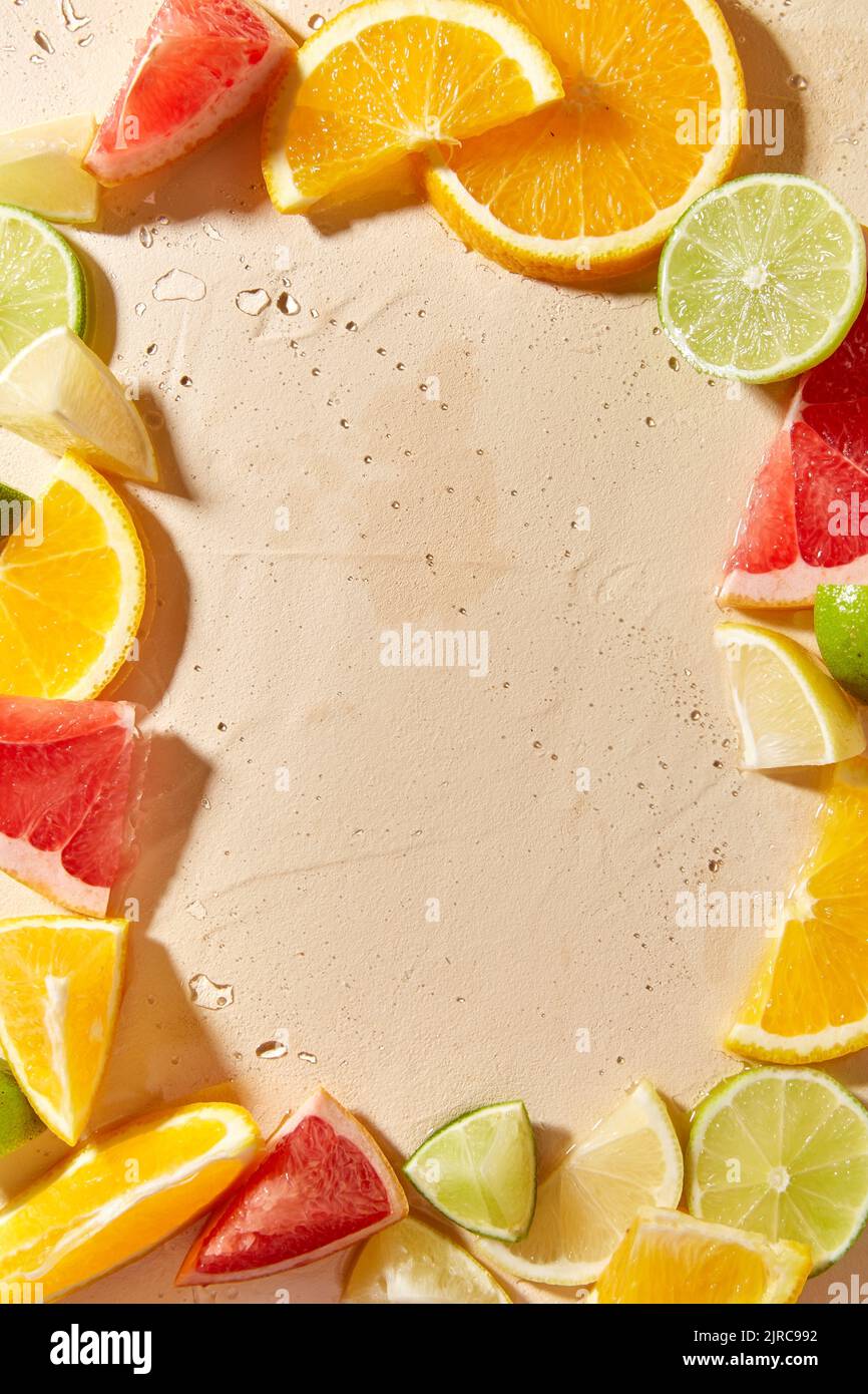 frame of slices of different citrus fruits Stock Photo - Alamy