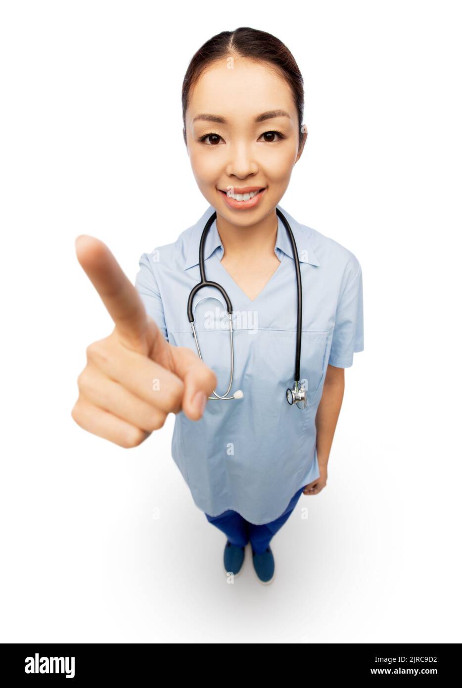 happy asian female doctor pointing to camera Stock Photo - Alamy
