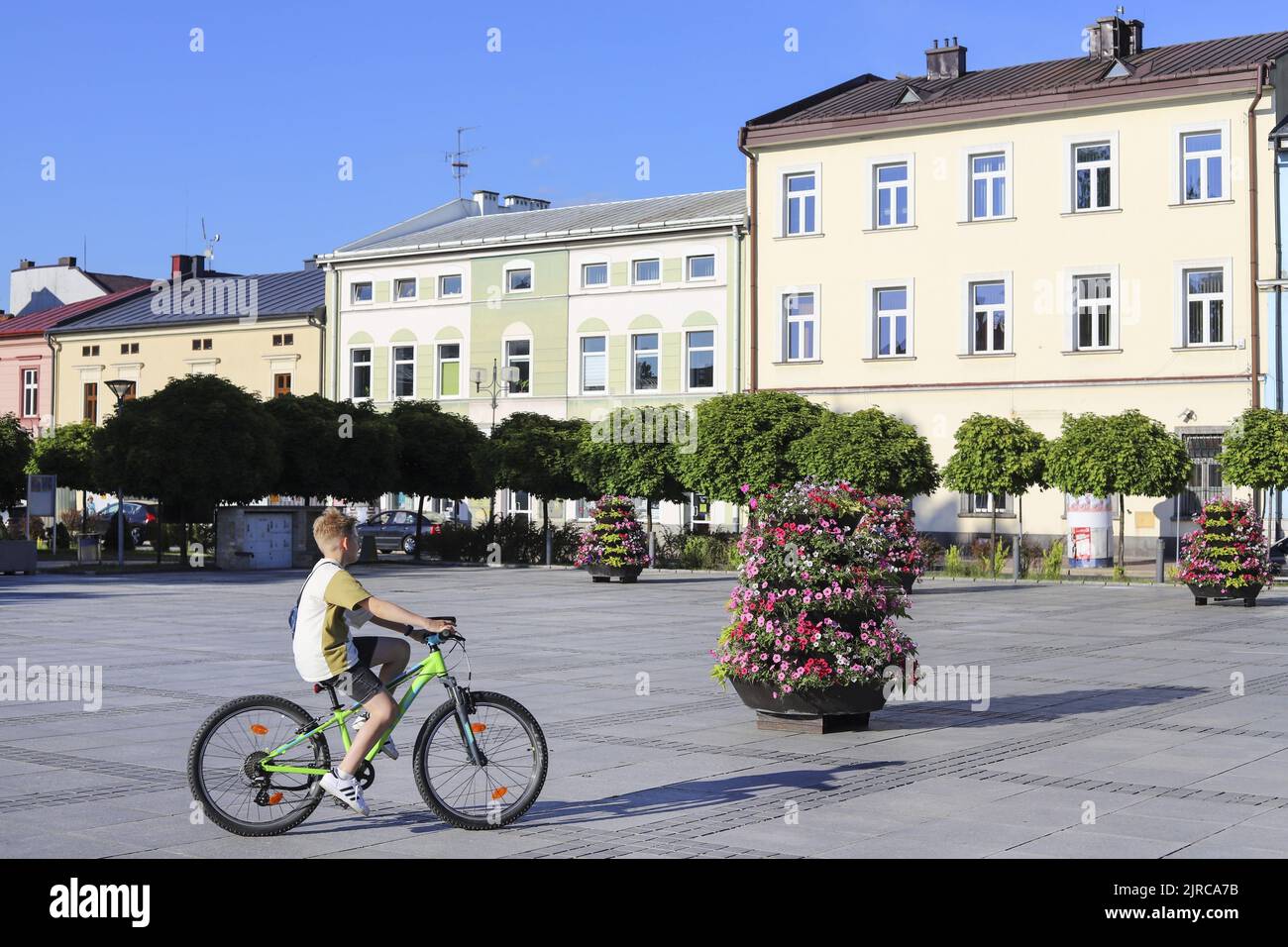 Colorful tenements by the main market square in Nowy Targ, Poland Stock ...