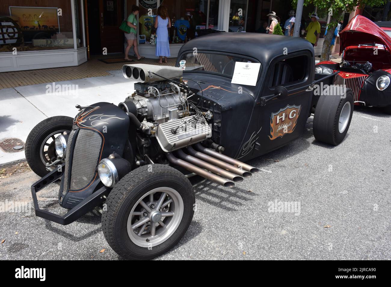 A vintage Supercharged Hot Rod on display at a car show Stock Photo - Alamy