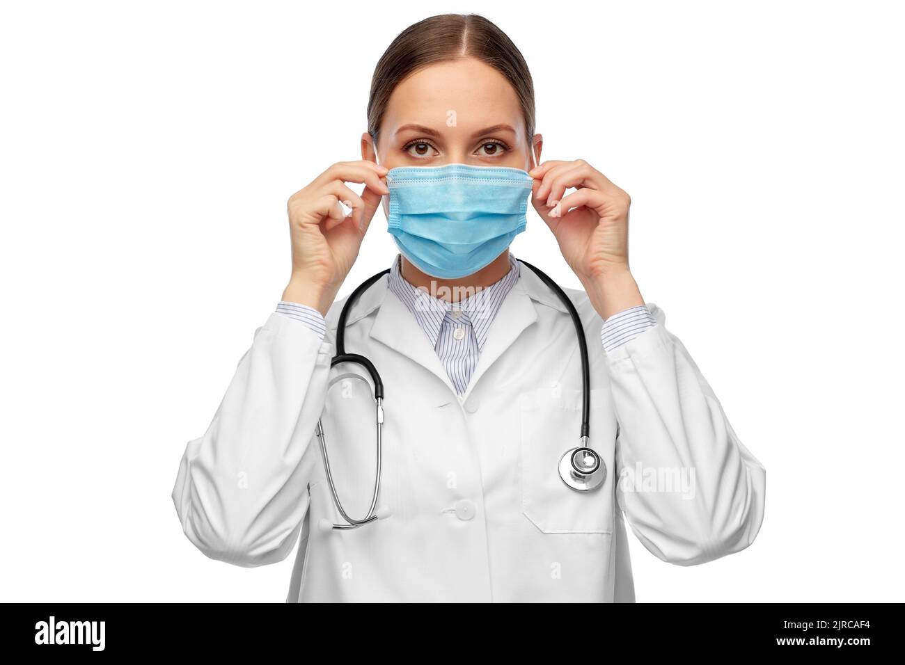Beautiful woman doctor wearing protective hi-res stock photography and ...