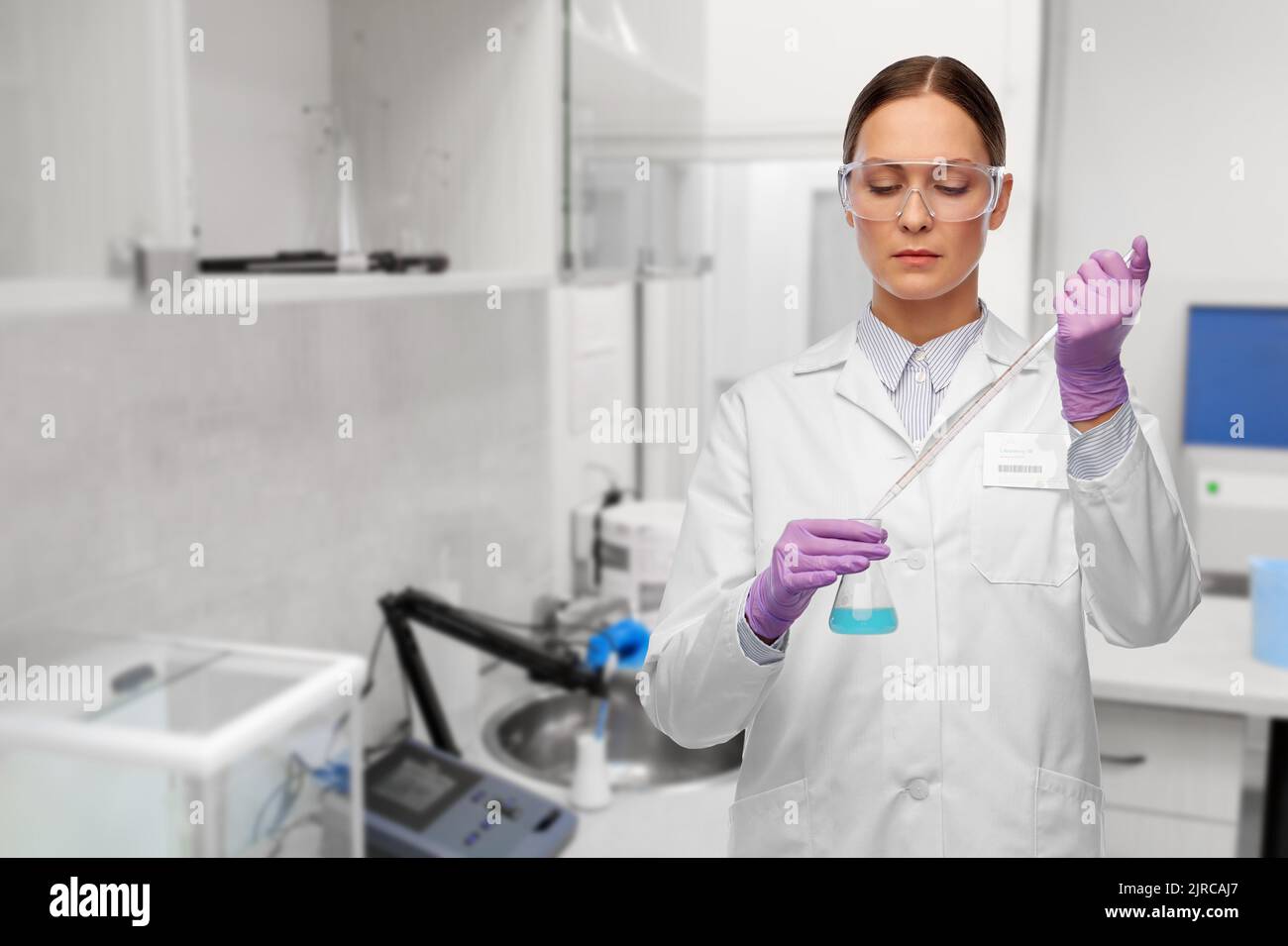 Serious female scientist test hi-res stock photography and images - Alamy