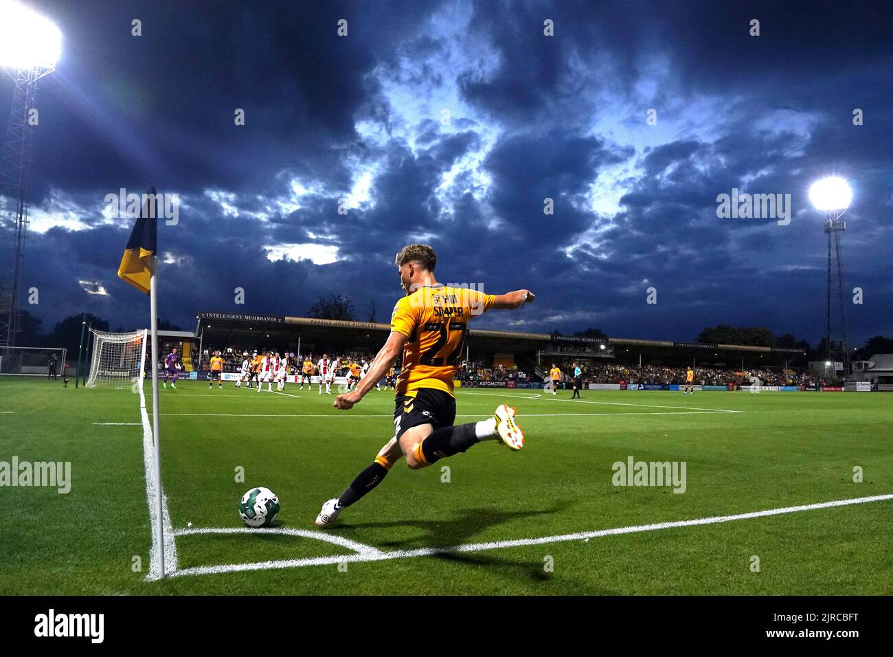 Cambridge United's Lewis Simper takes a corner during the Carabao Cup ...