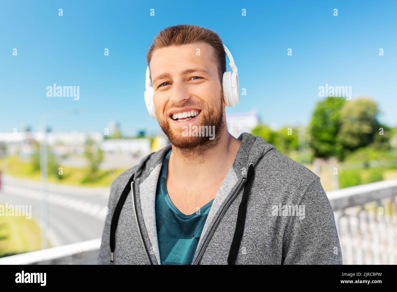 Portrait happy man listening hi-res stock photography and images - Alamy