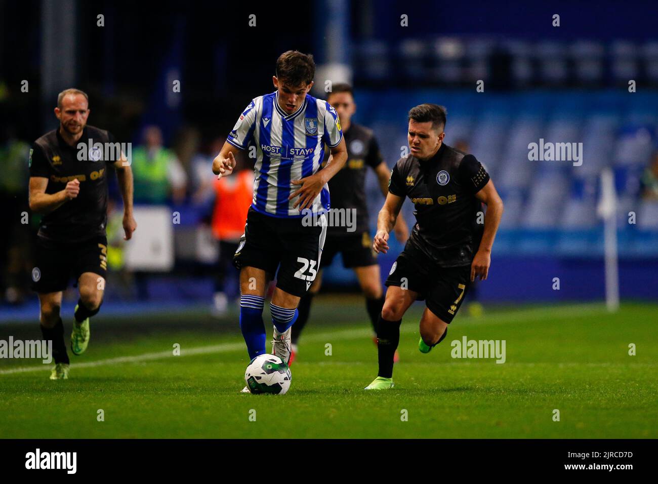 Jay Glover #23 of Sheffield Wednesday and Liam Kelly #7 of Rochdale ...