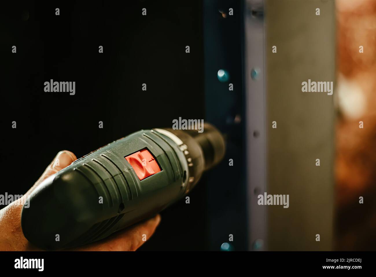 Man uses electric drill machine hi-res stock photography and images - Alamy