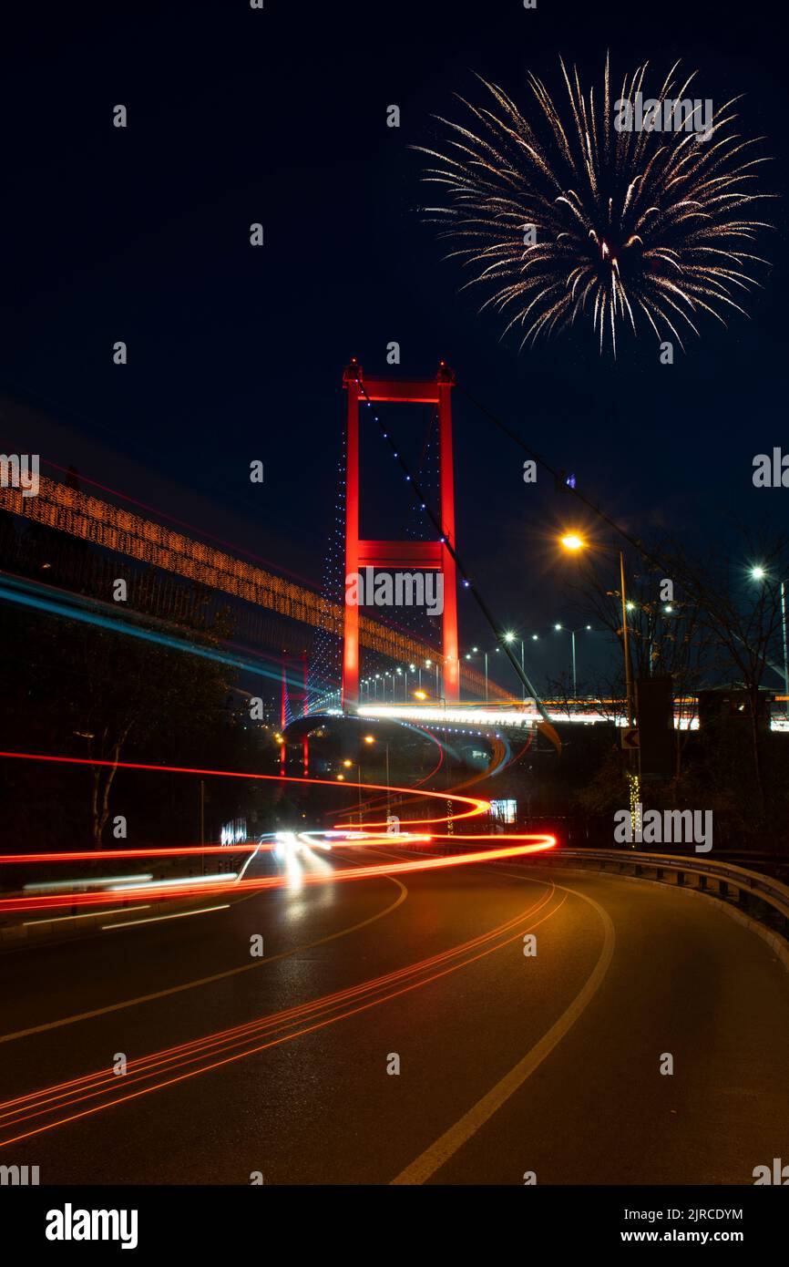 Fireworks exploding above the Bosphorus bridge. Long exposure view from ...