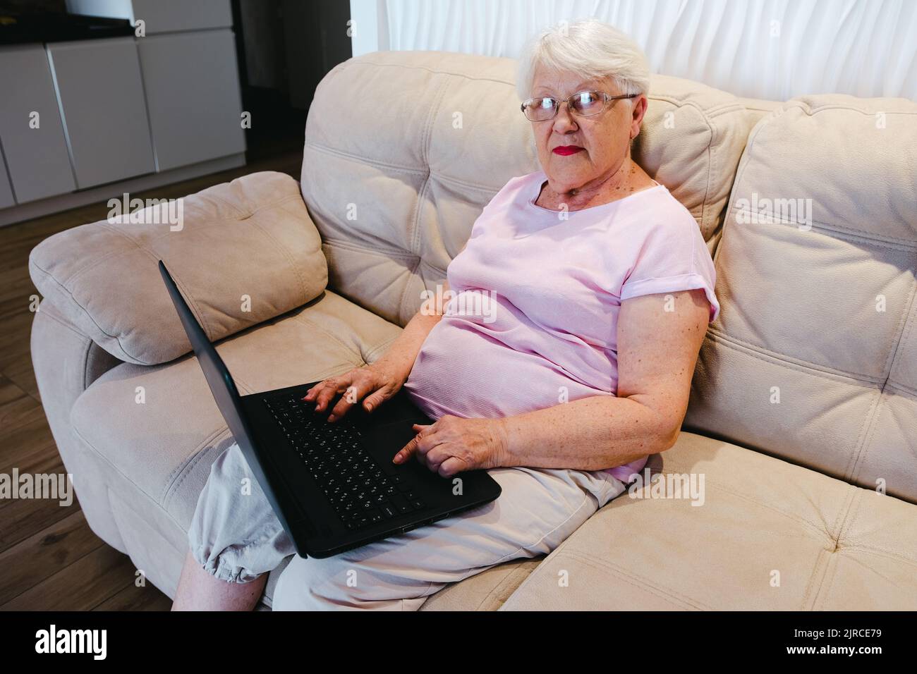 Senior mature older woman watching business training, online webinar on ...