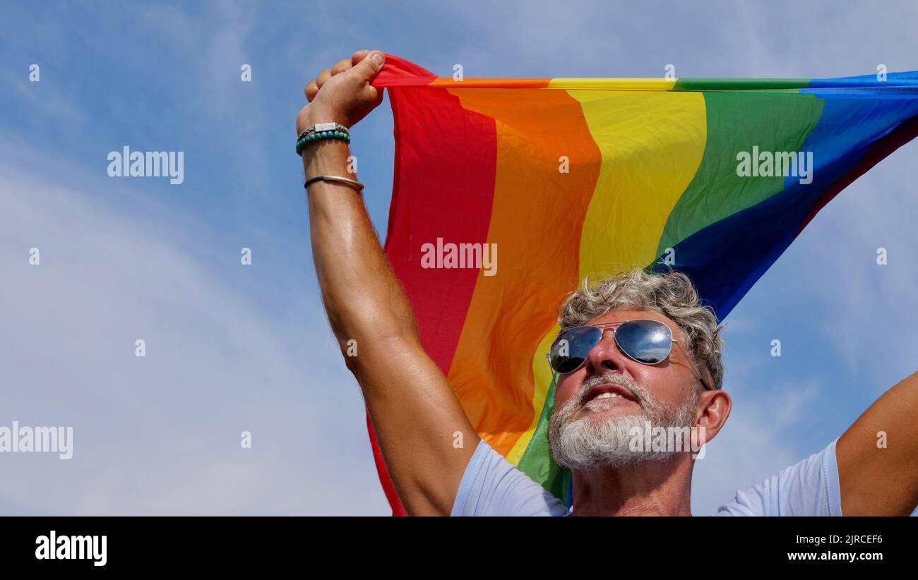 Portrait of a gray-haired elderly Caucasian man with a beard and ...