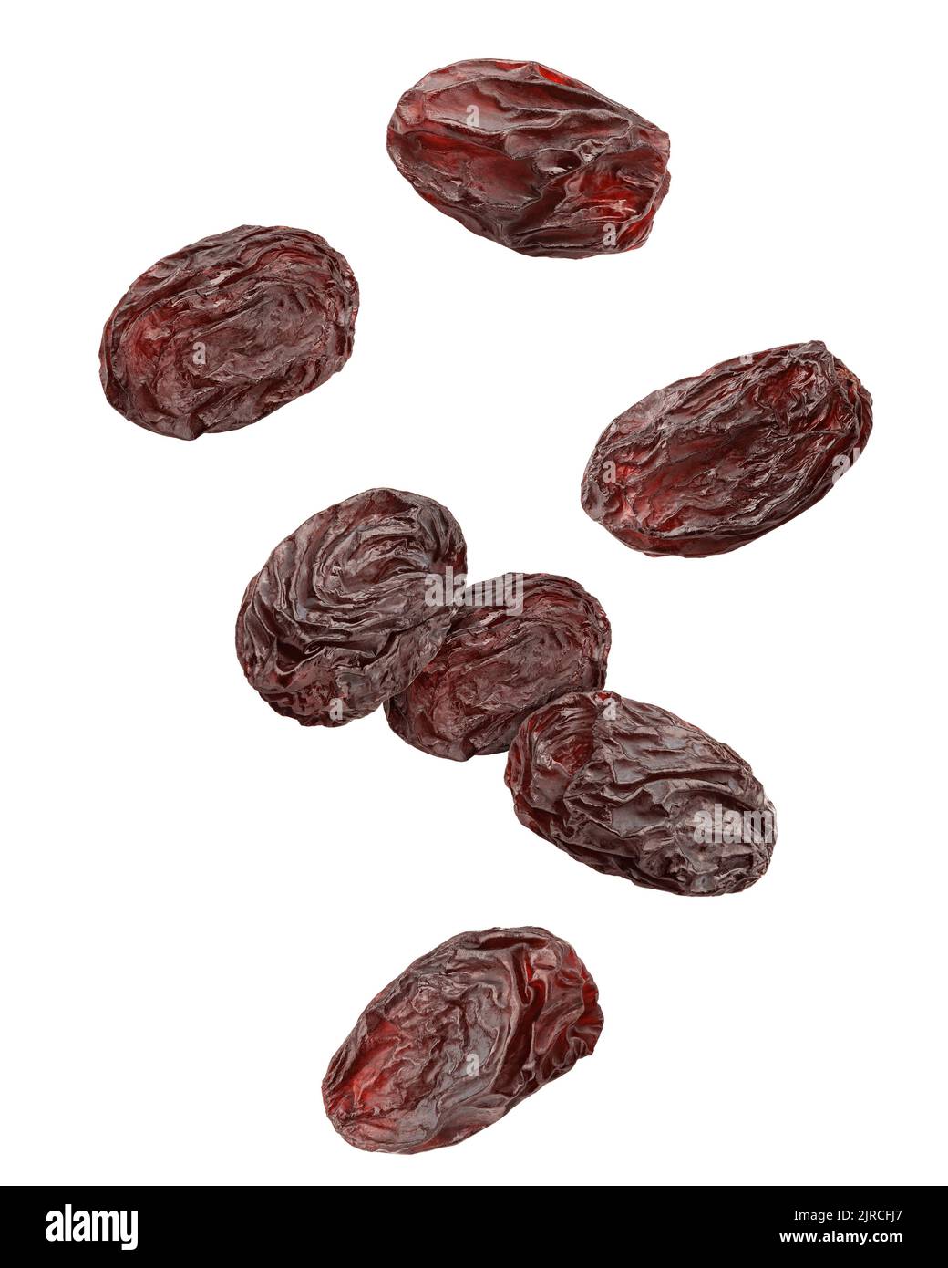 Falling raisin isolated on white background, clipping path, full depth ...
