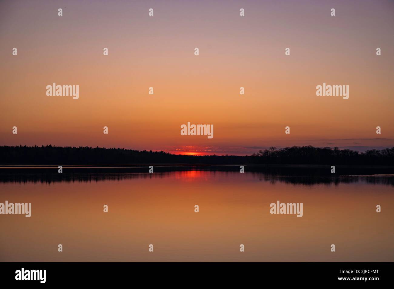 lake in spring at sunset Stock Photo - Alamy