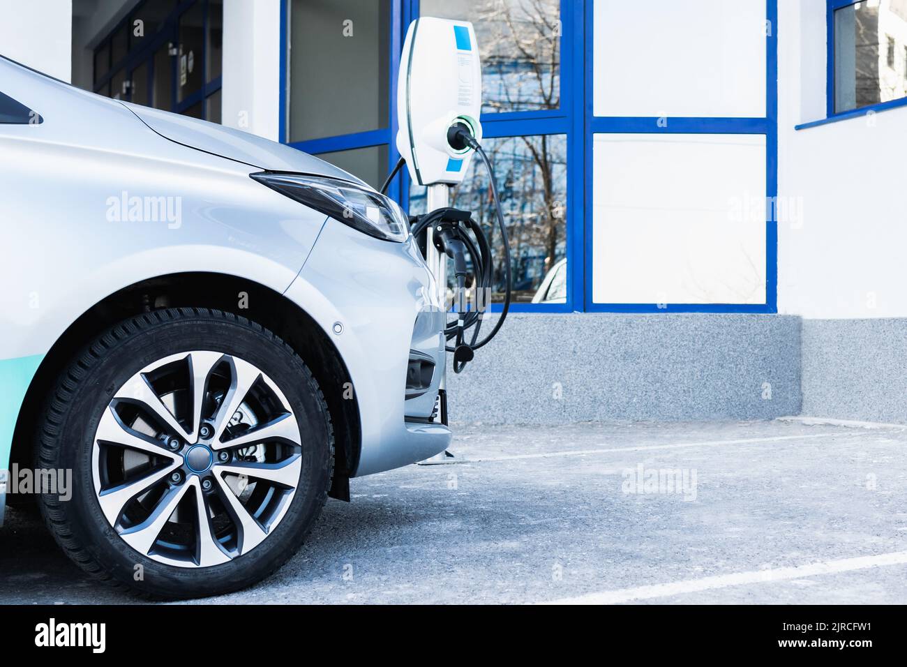 Electric vehicle charging cable next hi-res stock photography and ...