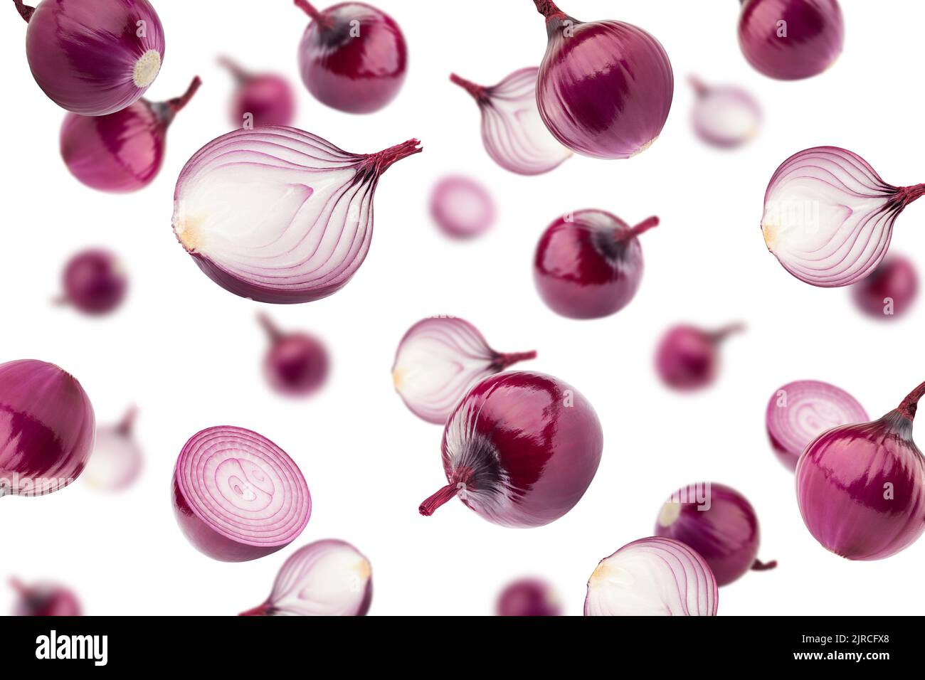Falling red onion isolated on white background, selective focus Stock ...