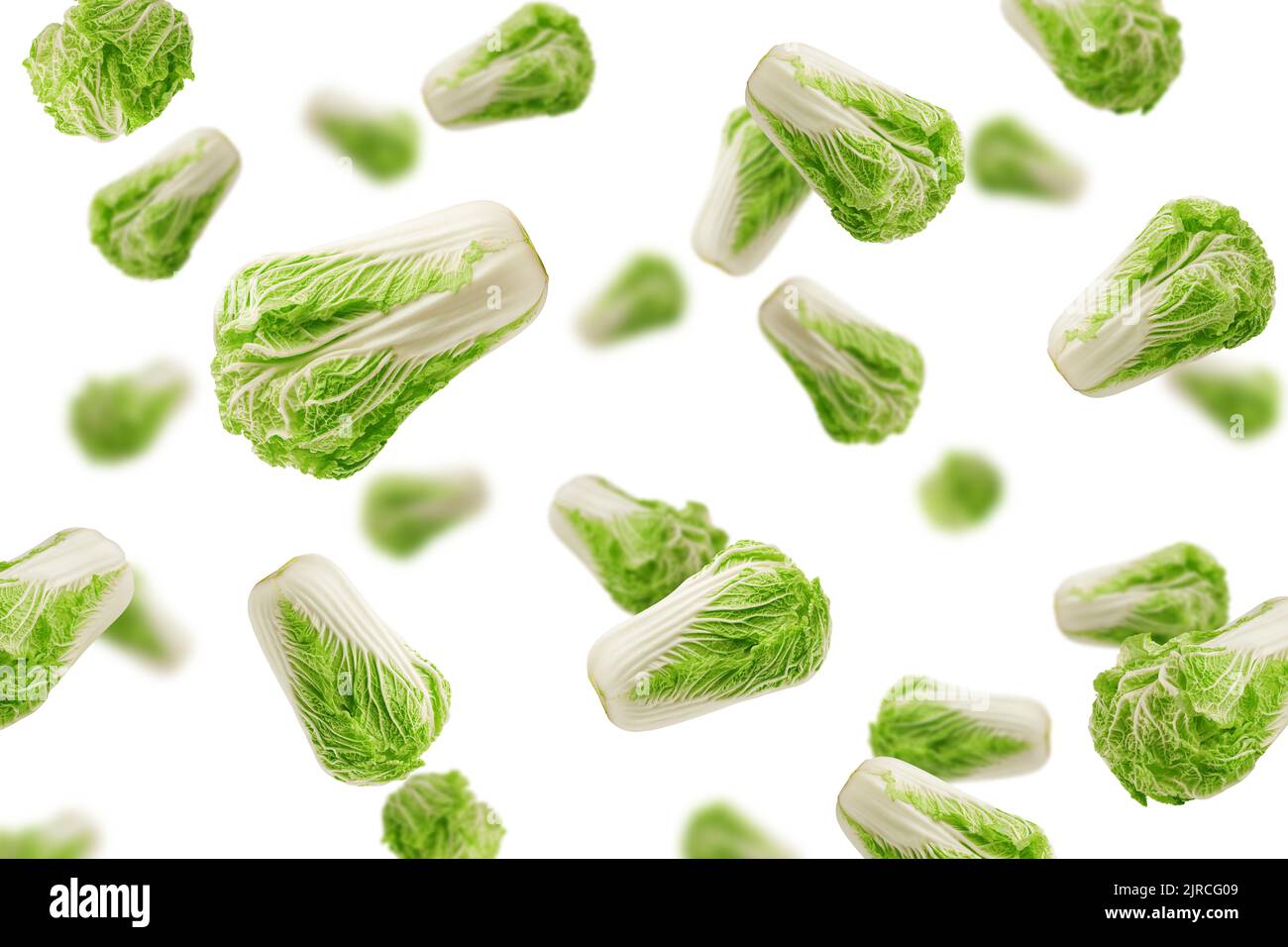 Falling chinese cabbage, isolated on white background, selective focus ...