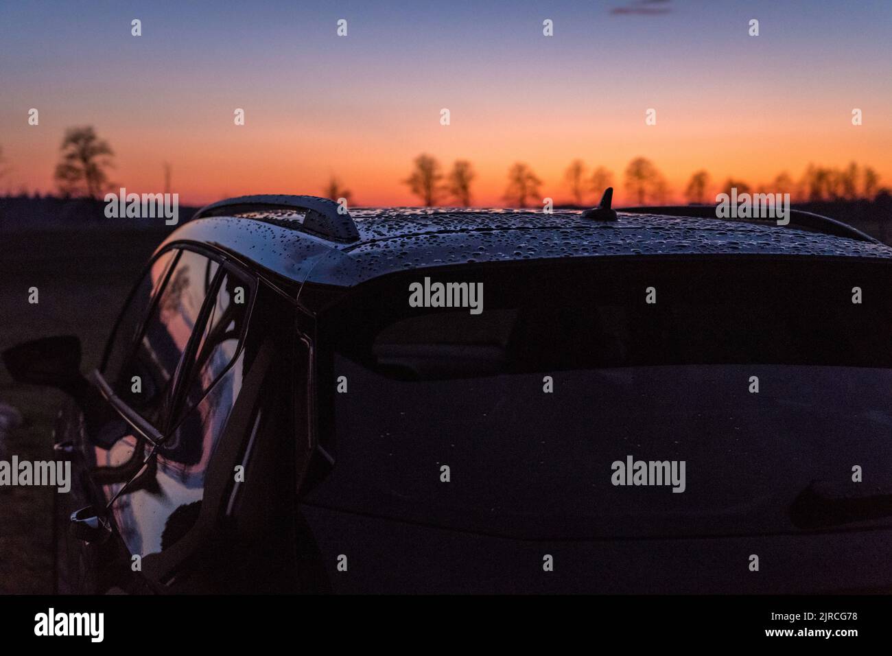 sunset reflecting from car windows Stock Photo - Alamy