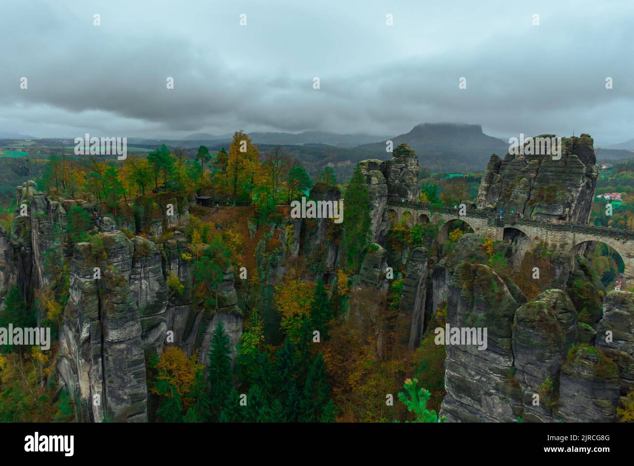 Saxon Switzerland Mountains With Beautiful Green Trees With Clouds ...