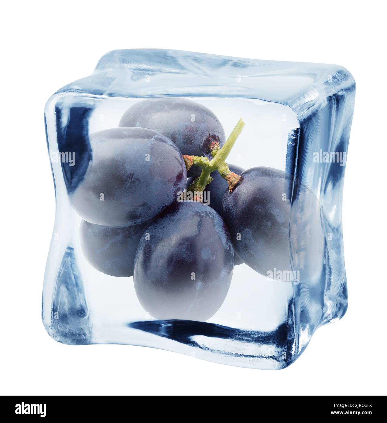 purple grape in ice cube, isolated on white background, clipping path ...