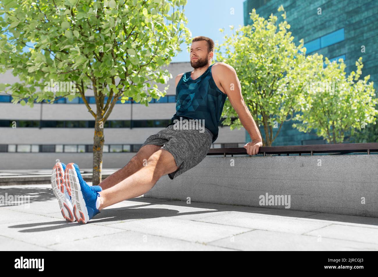 Strong young guy doing triceps hi-res stock photography and images - Alamy