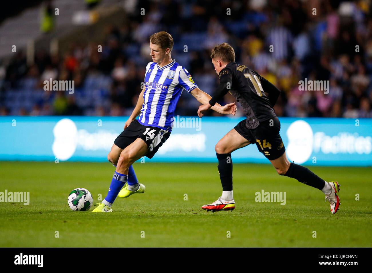 George Byers #14 of Sheffield Wednesday and Ethan Brierley #14 of ...