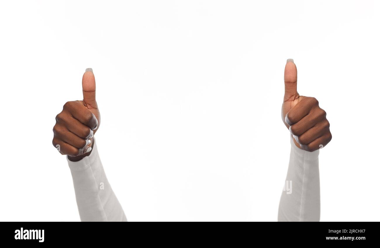 hands of african american woman showing thumbs up Stock Photo - Alamy