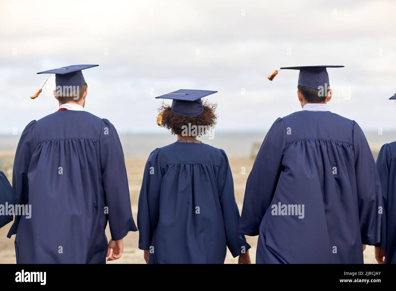 graduate students or bachelors in mortar boards Stock Photo - Alamy