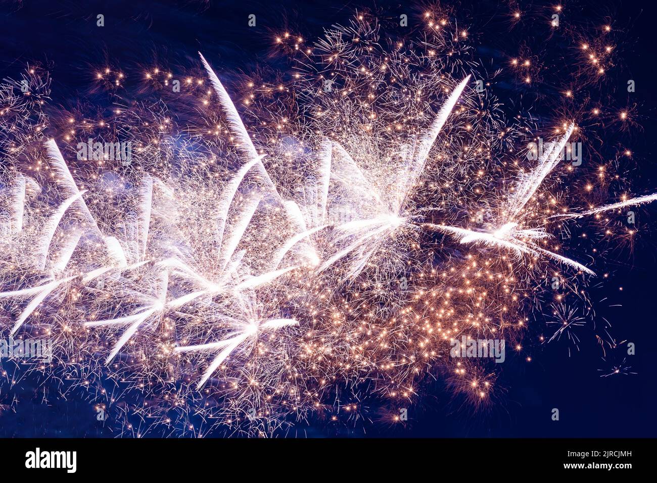 Bright light flash of fireworks, against the background of the night ...