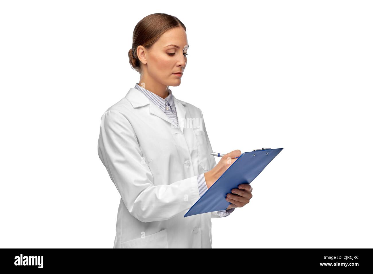 Serious female doctor writing hi-res stock photography and images - Alamy
