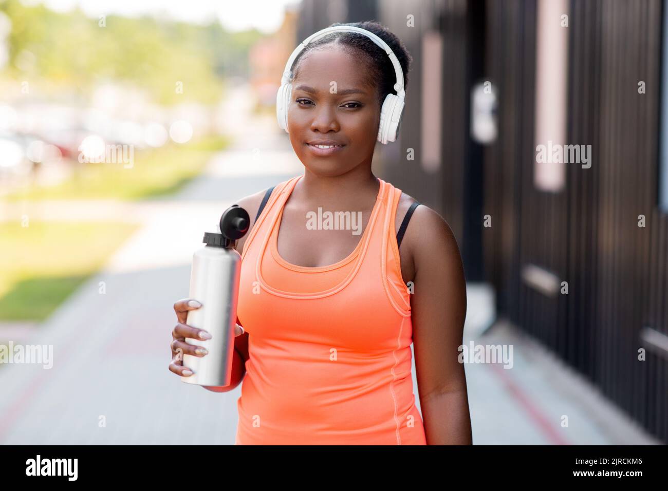 african american woman drinking water after sports Stock Photo - Alamy