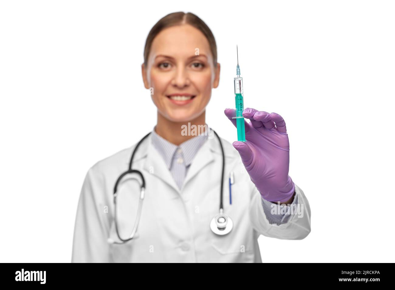smiling female doctor with medicine in syringe Stock Photo - Alamy