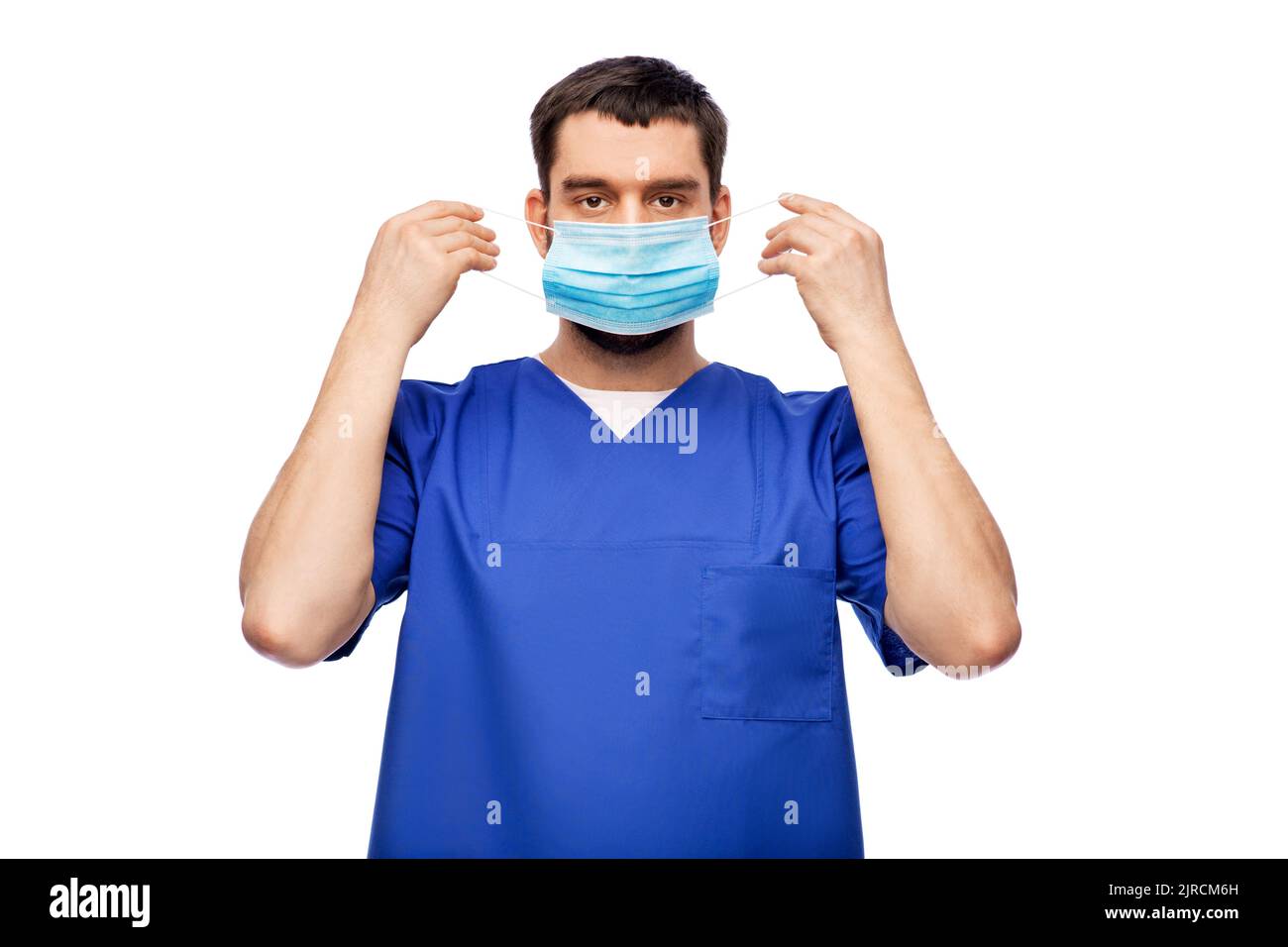 Doctor mask on blue uniform hi-res stock photography and images - Alamy