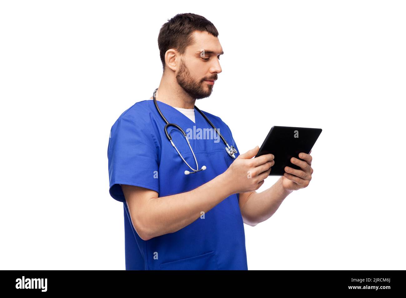 doctor or male nurse using tablet computer Stock Photo - Alamy