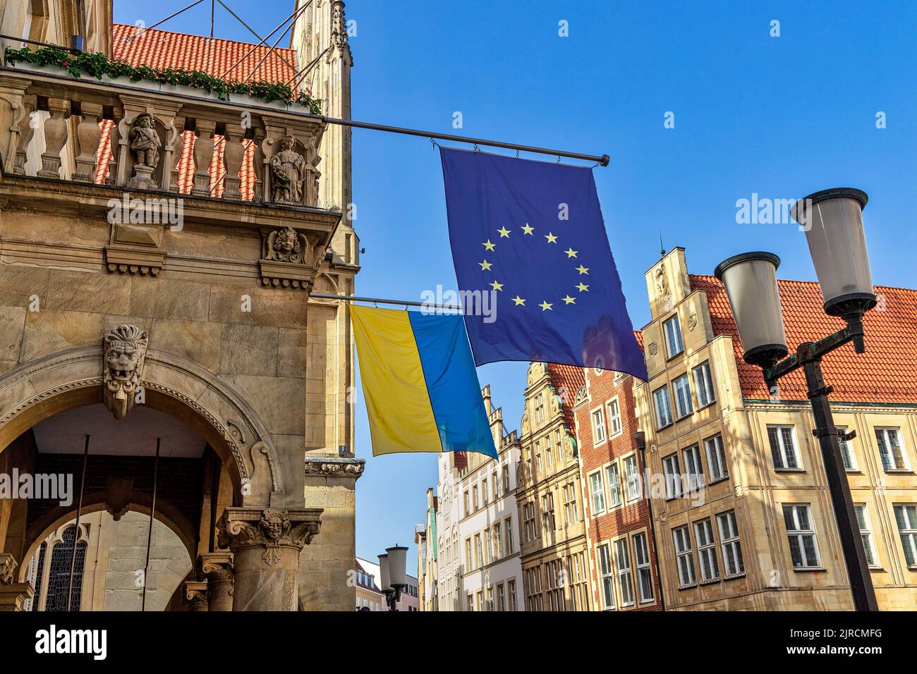 Flags of Ukraine and European Union on City council building in Munster ...