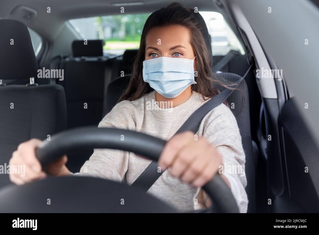 Woman driver mask car hi-res stock photography and images - Alamy