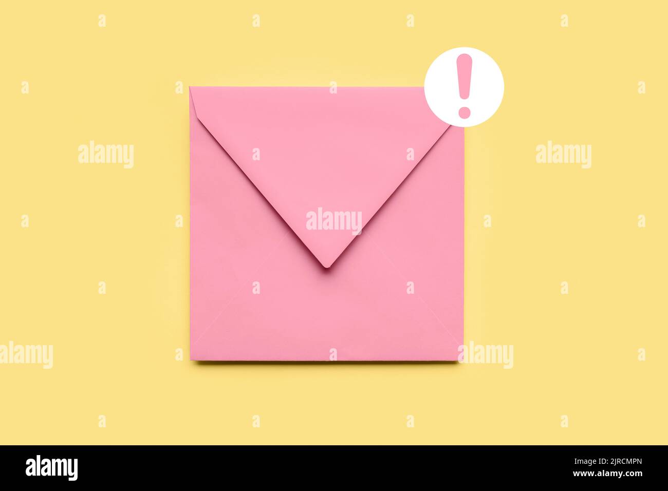 Paper envelope with urgent message on yellow background Stock Photo - Alamy