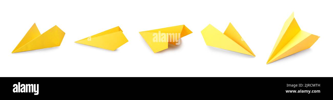 Set of yellow paper plane isolated on white Stock Photo - Alamy