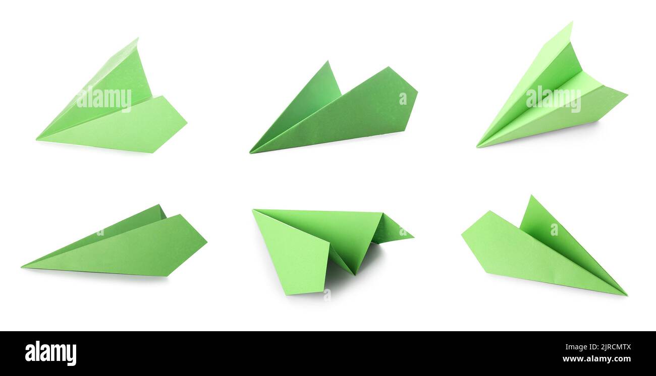 Set of green paper plane isolated on white Stock Photo - Alamy