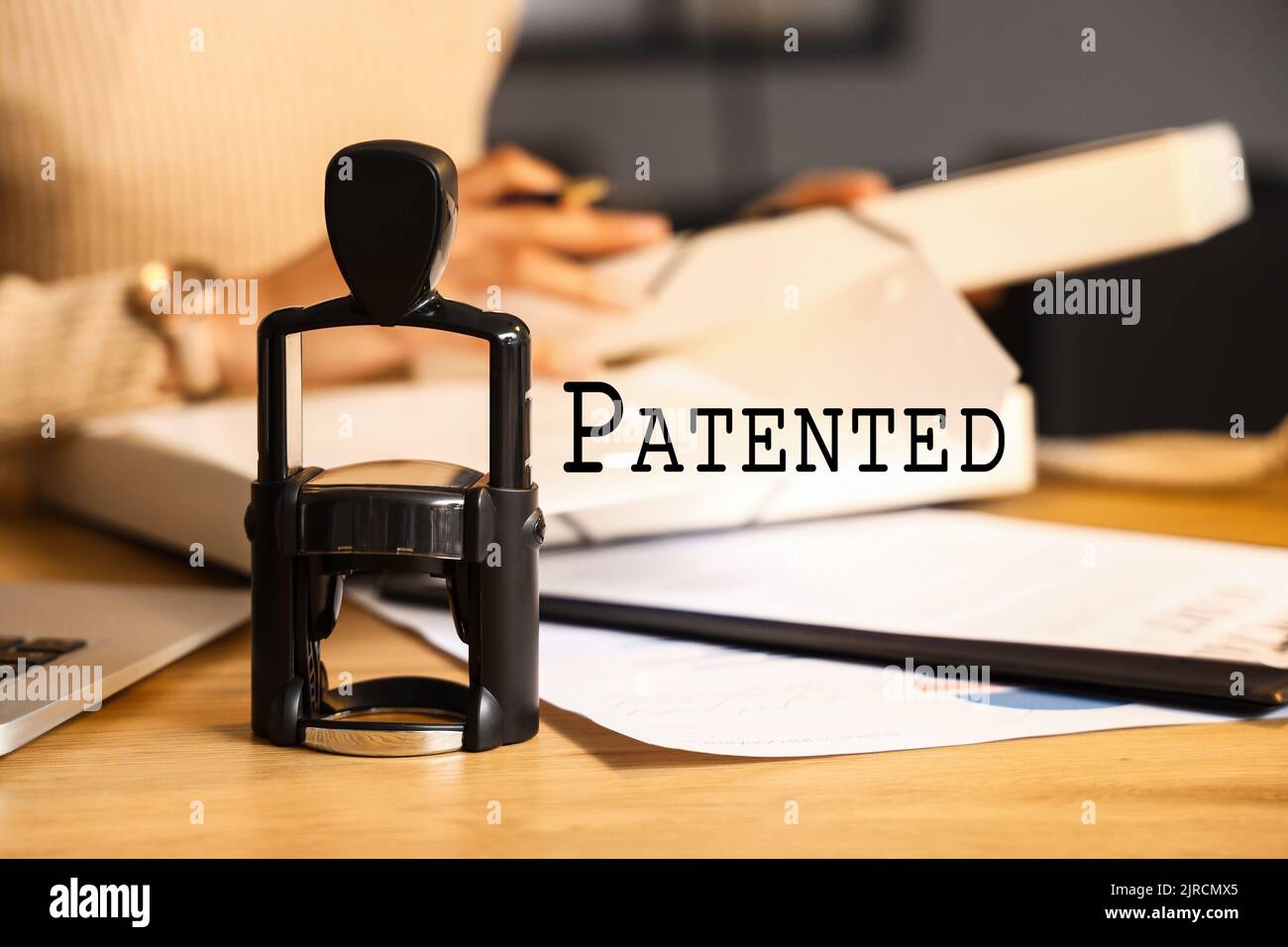 Stamp on table of notary public in office. Concept of patent and ...