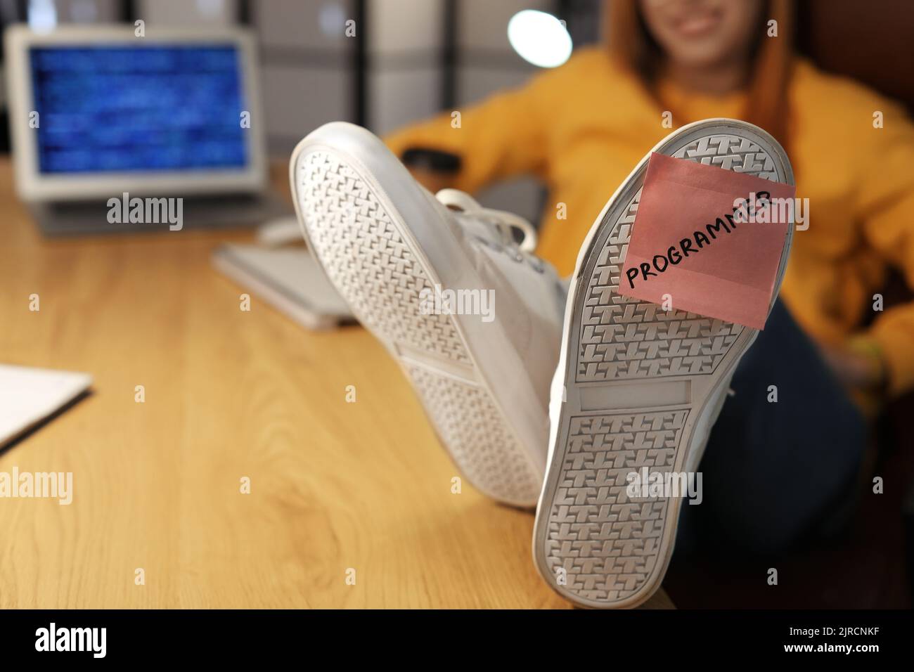 Programmer with sticky note on his shoe in server room, closeup Stock ...