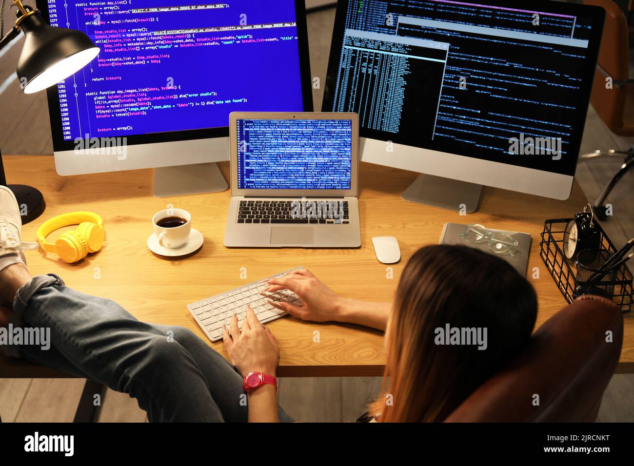 Transgender programmer working in server room Stock Photo - Alamy