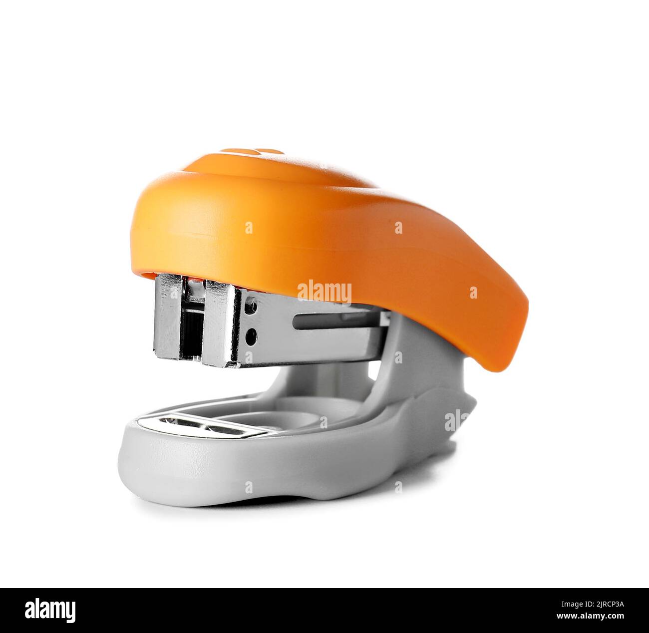 Modern orange stapler on white background Stock Photo - Alamy