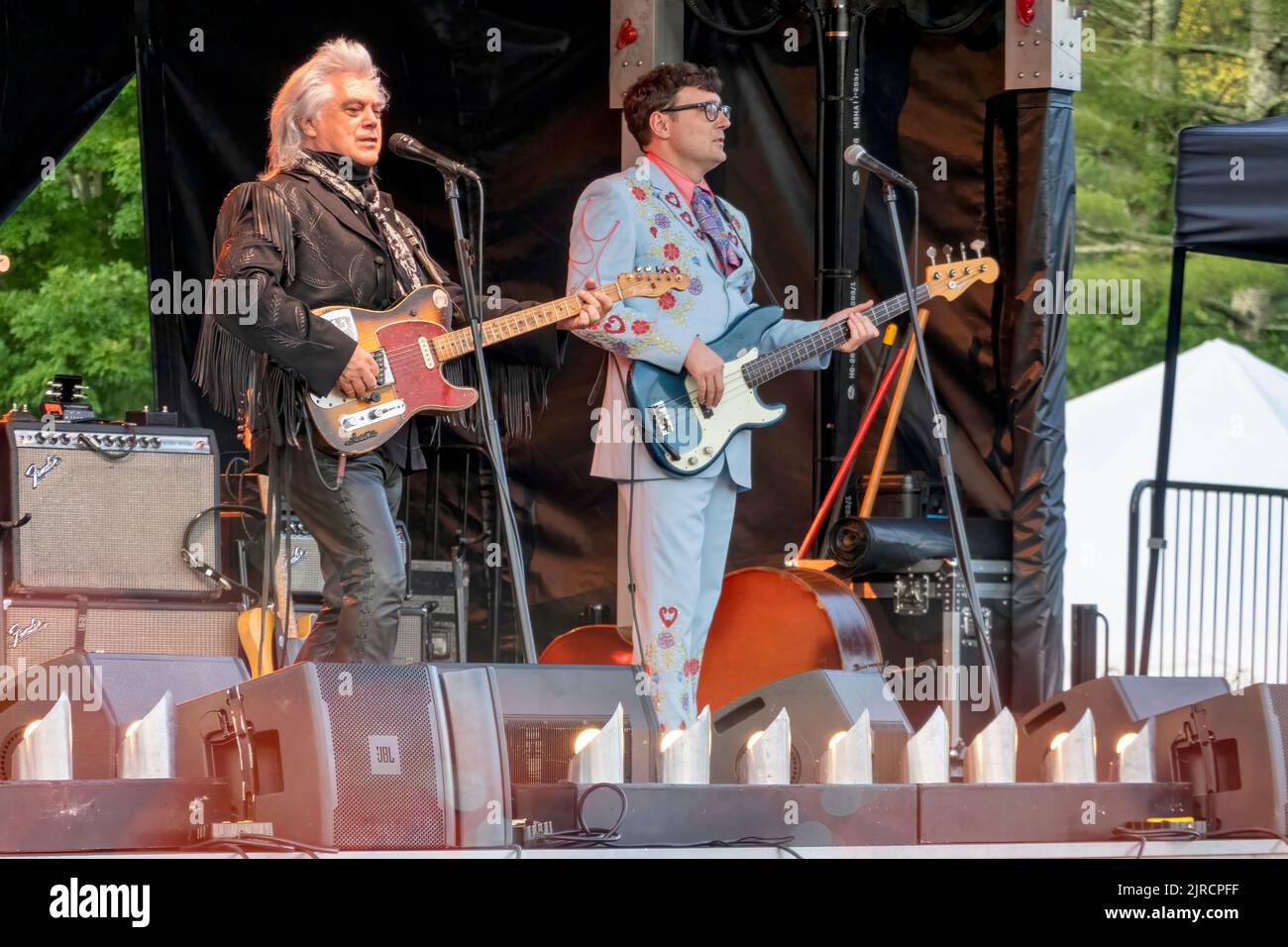 Marty Stuart and Chris Scruggs perform in an outdoor concert, part of ...