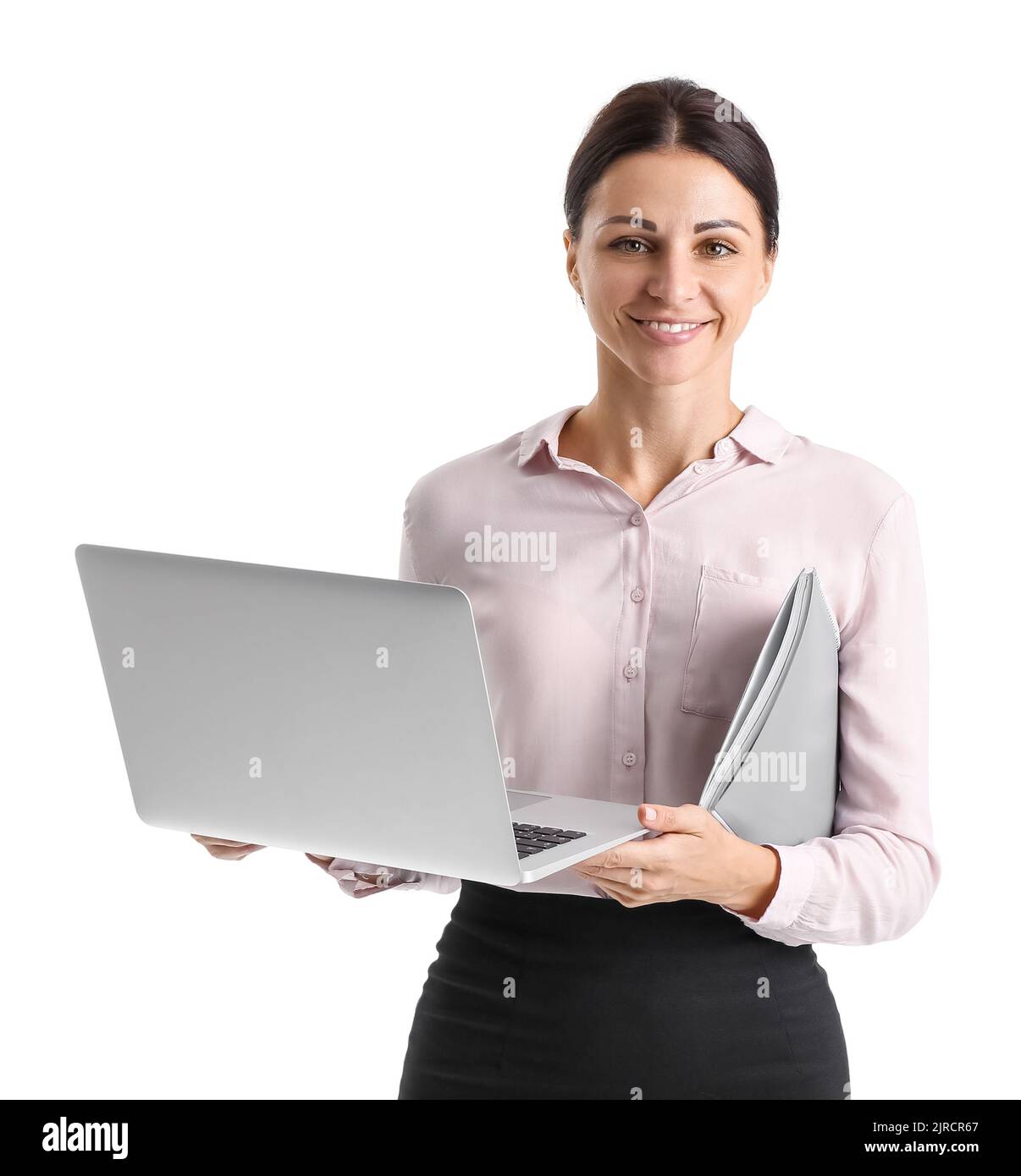Female teacher of computer sciences with laptop and notebook on white ...
