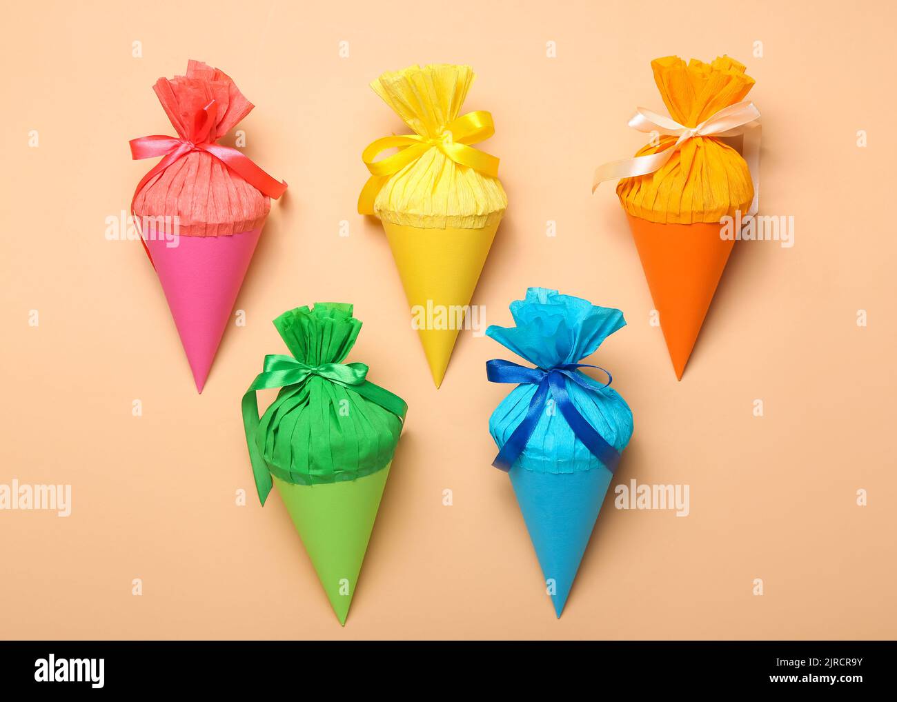 School cones on orange background Stock Photo - Alamy