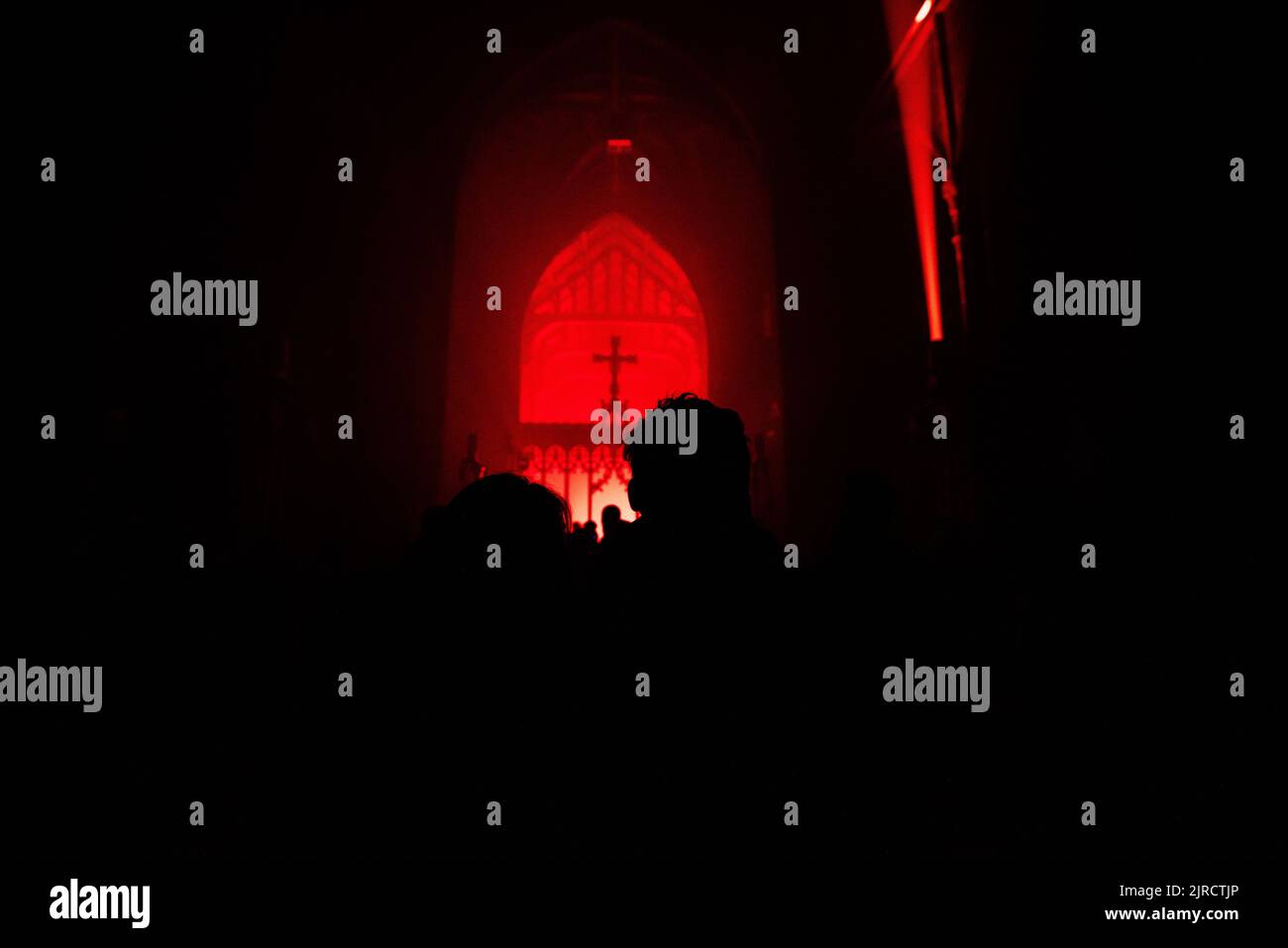 Spooky red light in church Horror Background Halloween Stock Photo - Alamy