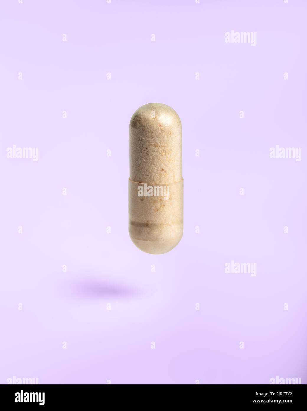Floating Vitamin pills, abstract shot Stock Photo - Alamy